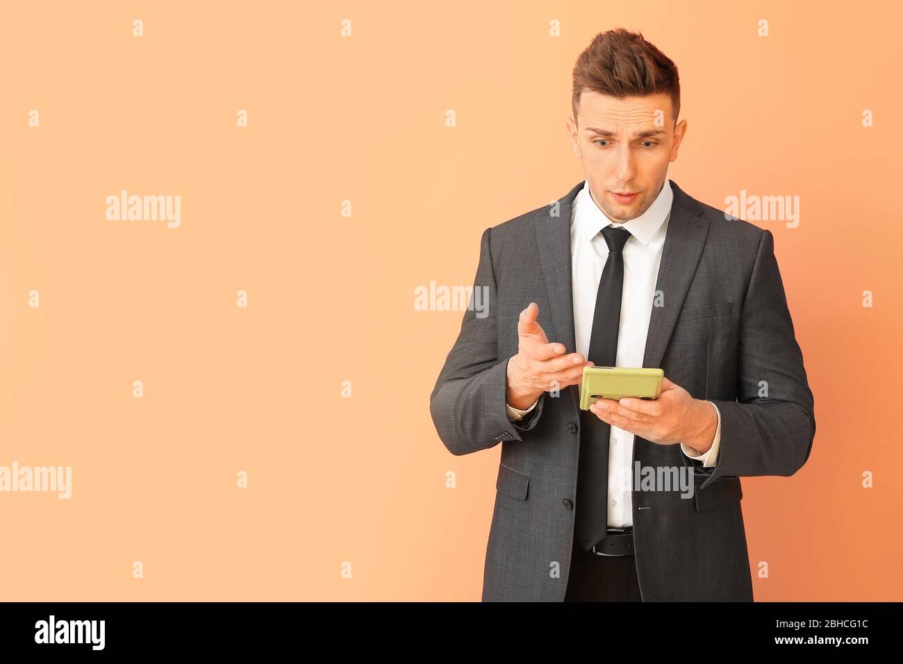 Confused young man counting money hi-res stock photography and images ...