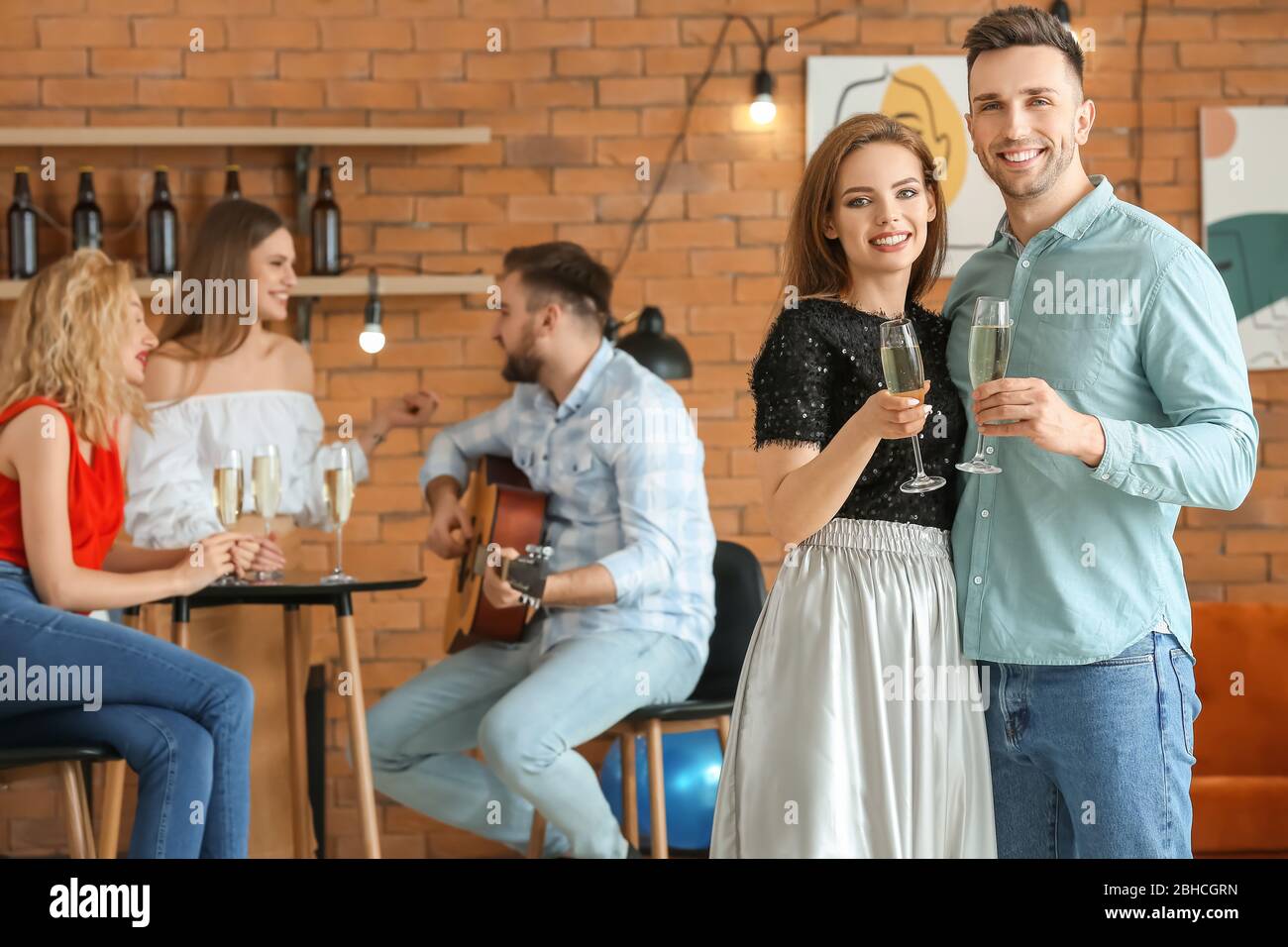 Young people having party at home Stock Photo - Alamy