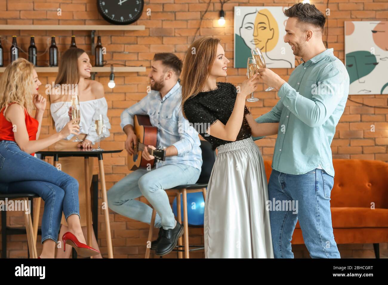 Young people having party at home Stock Photo - Alamy