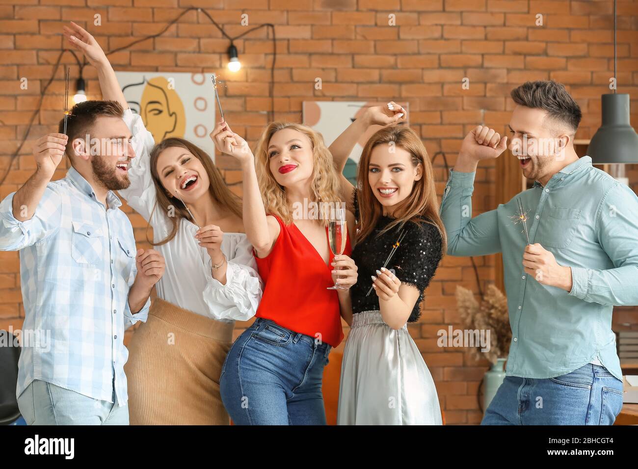Young people having party at home Stock Photo - Alamy