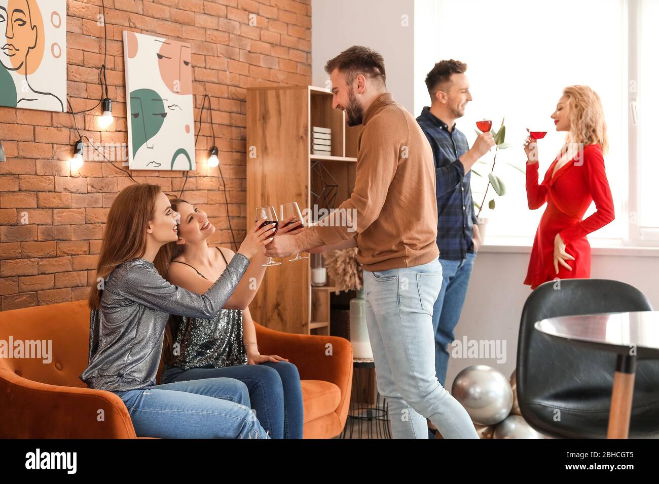 Young people having party at home Stock Photo - Alamy