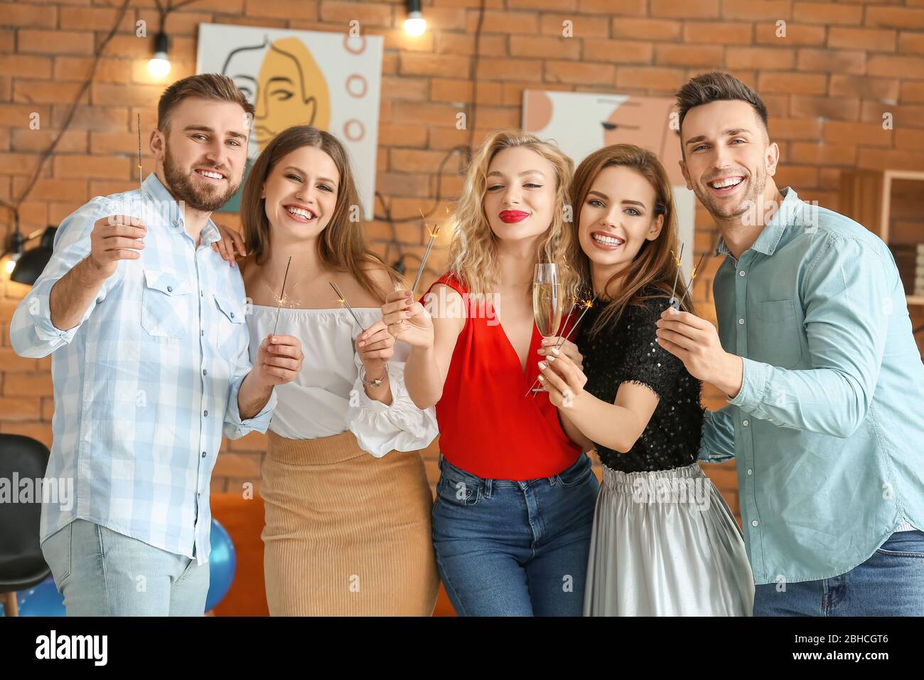 Young people having party at home Stock Photo - Alamy
