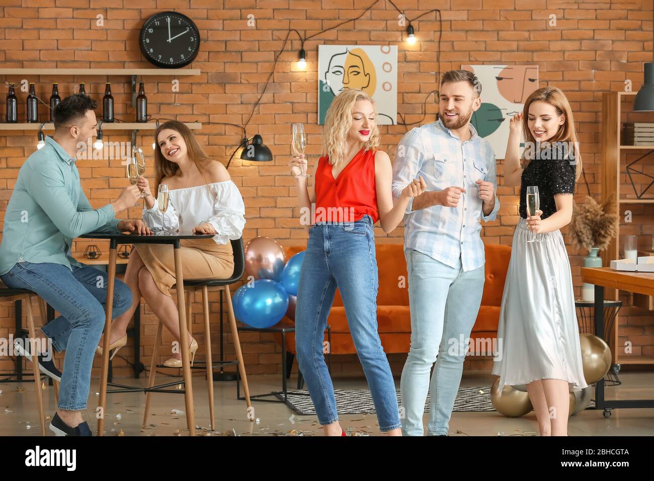 Young people having party at home Stock Photo - Alamy