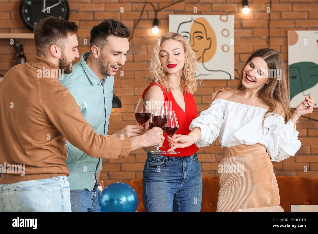 Young people having party at home Stock Photo - Alamy