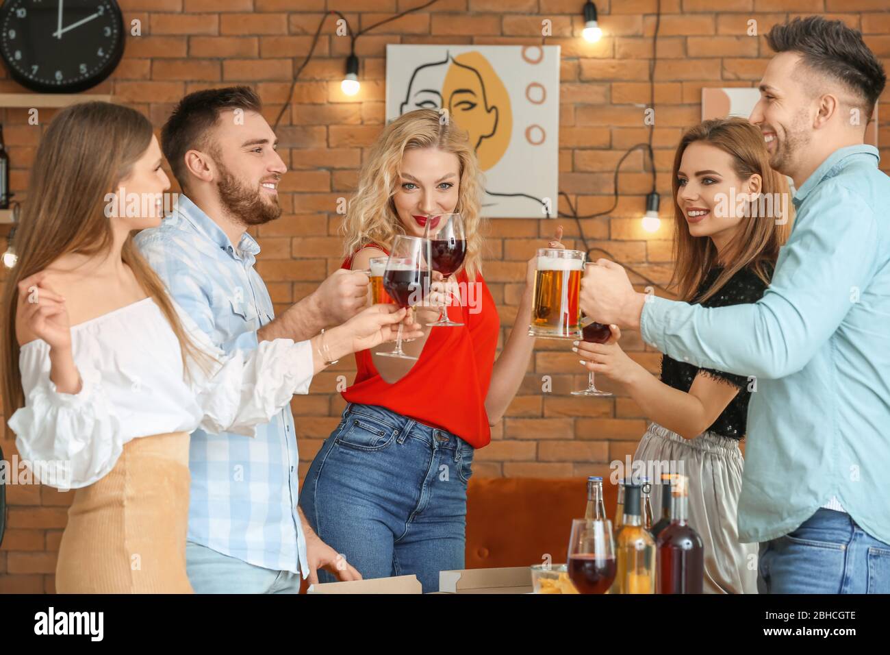 Young people having party at home Stock Photo - Alamy