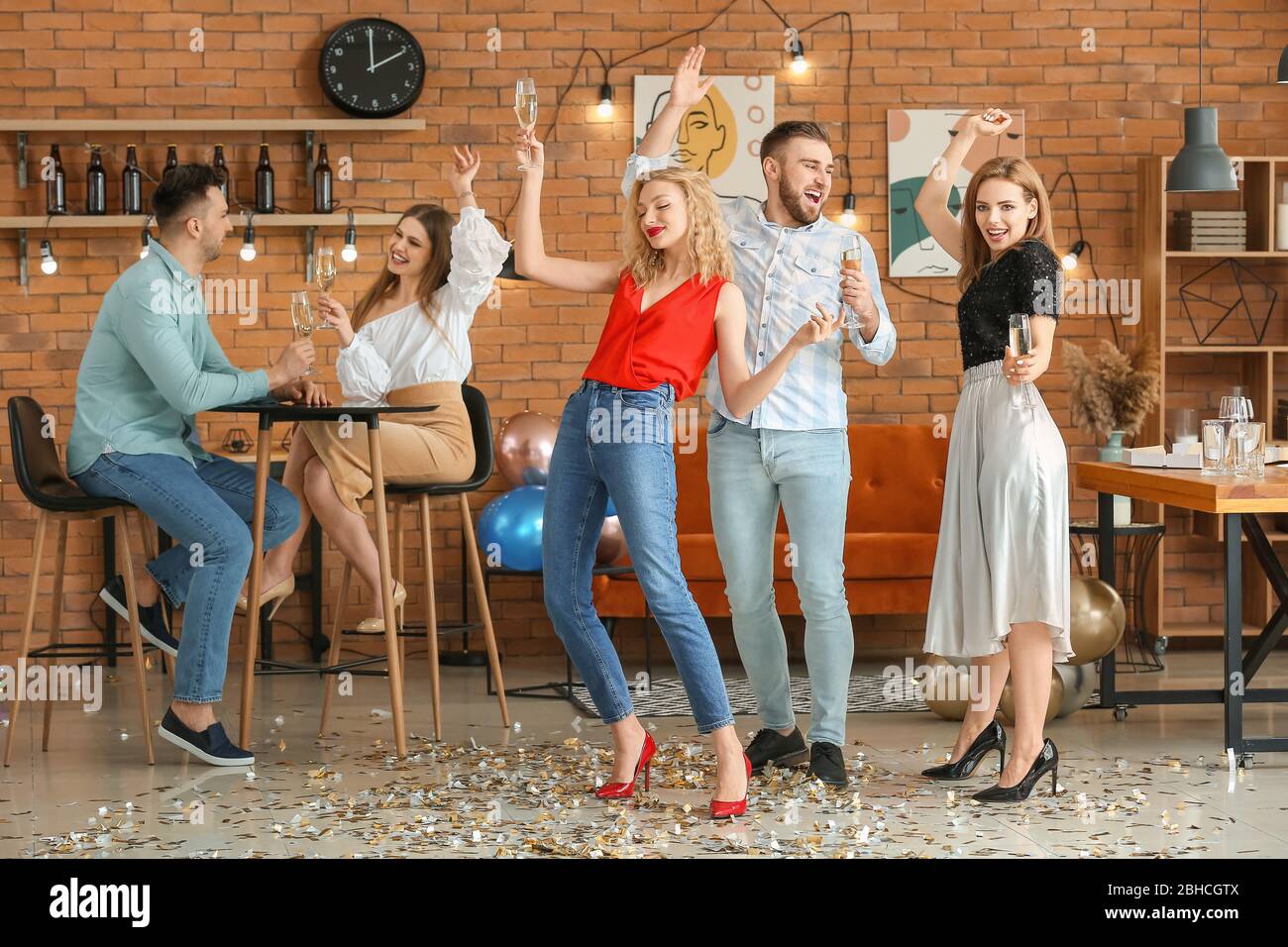 Young people having party at home Stock Photo - Alamy