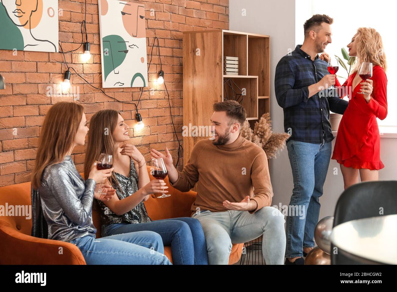 Young people having party at home Stock Photo - Alamy