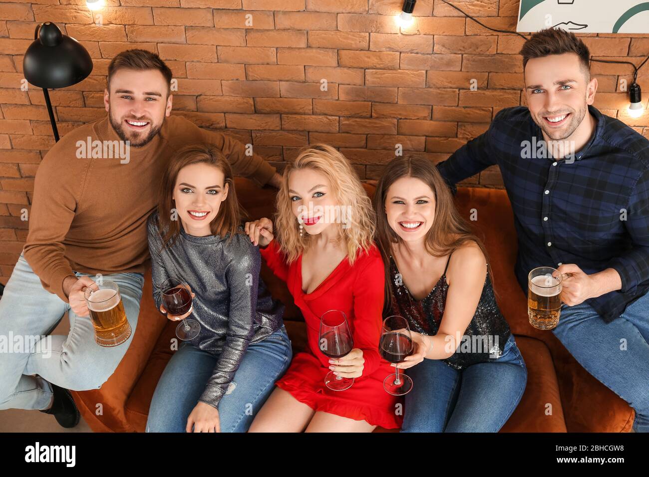 Young people having party at home Stock Photo - Alamy