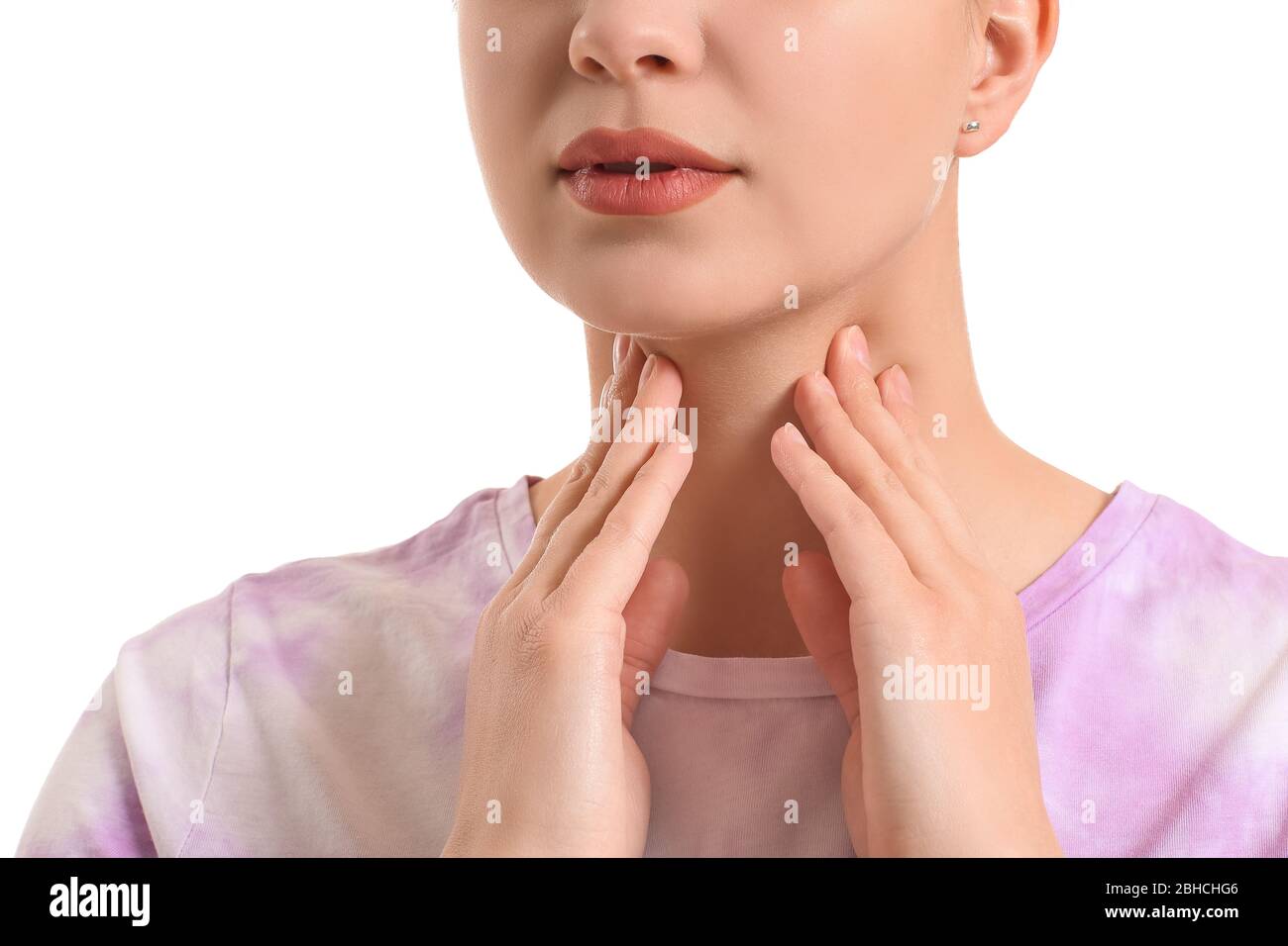 Young woman with thyroid gland problem on white background Stock Photo ...