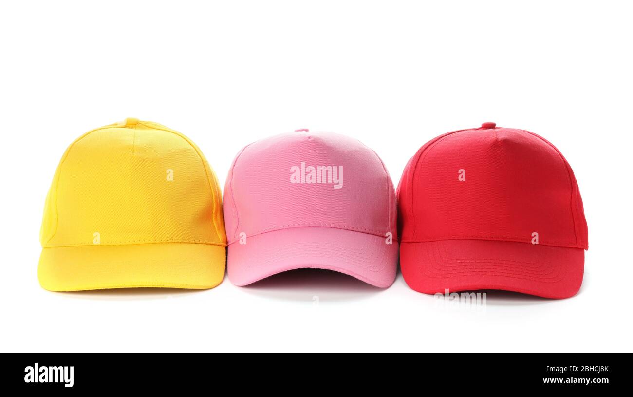 Blank caps on white background Stock Photo - Alamy