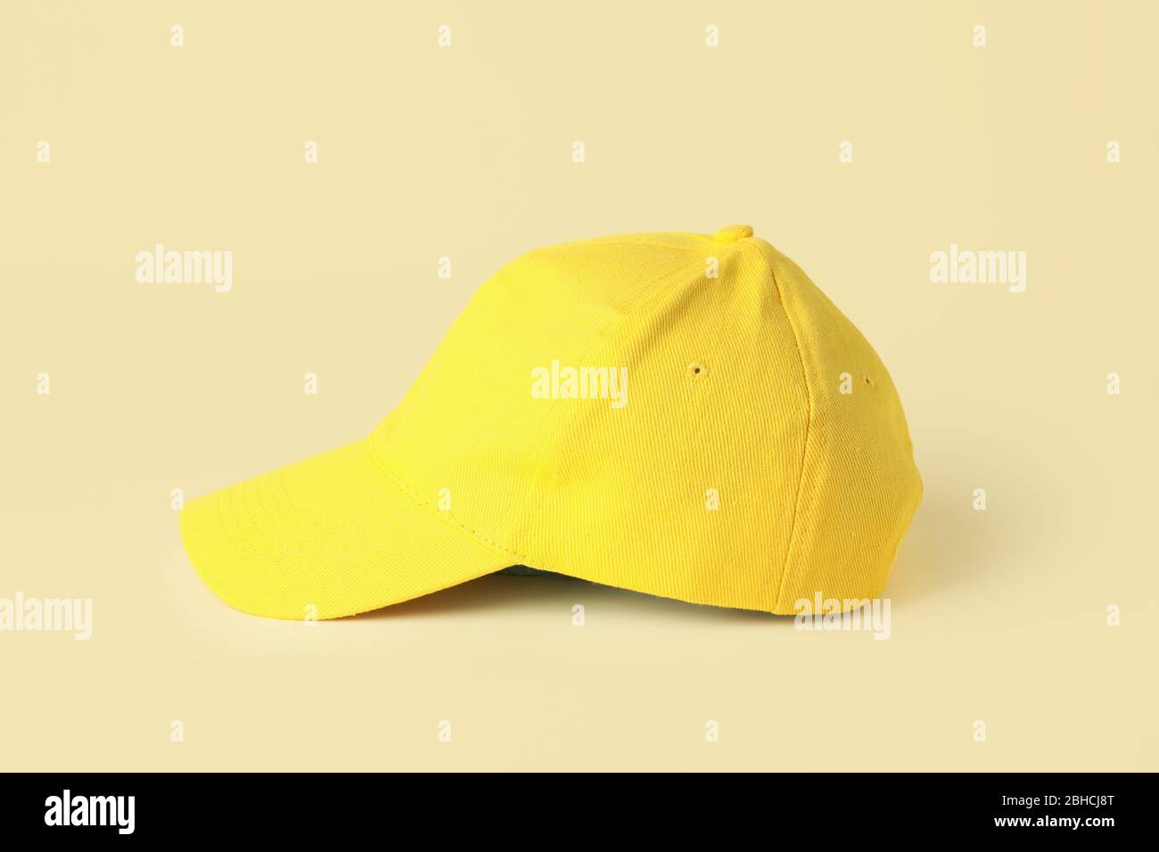 Blank cap on color background Stock Photo - Alamy