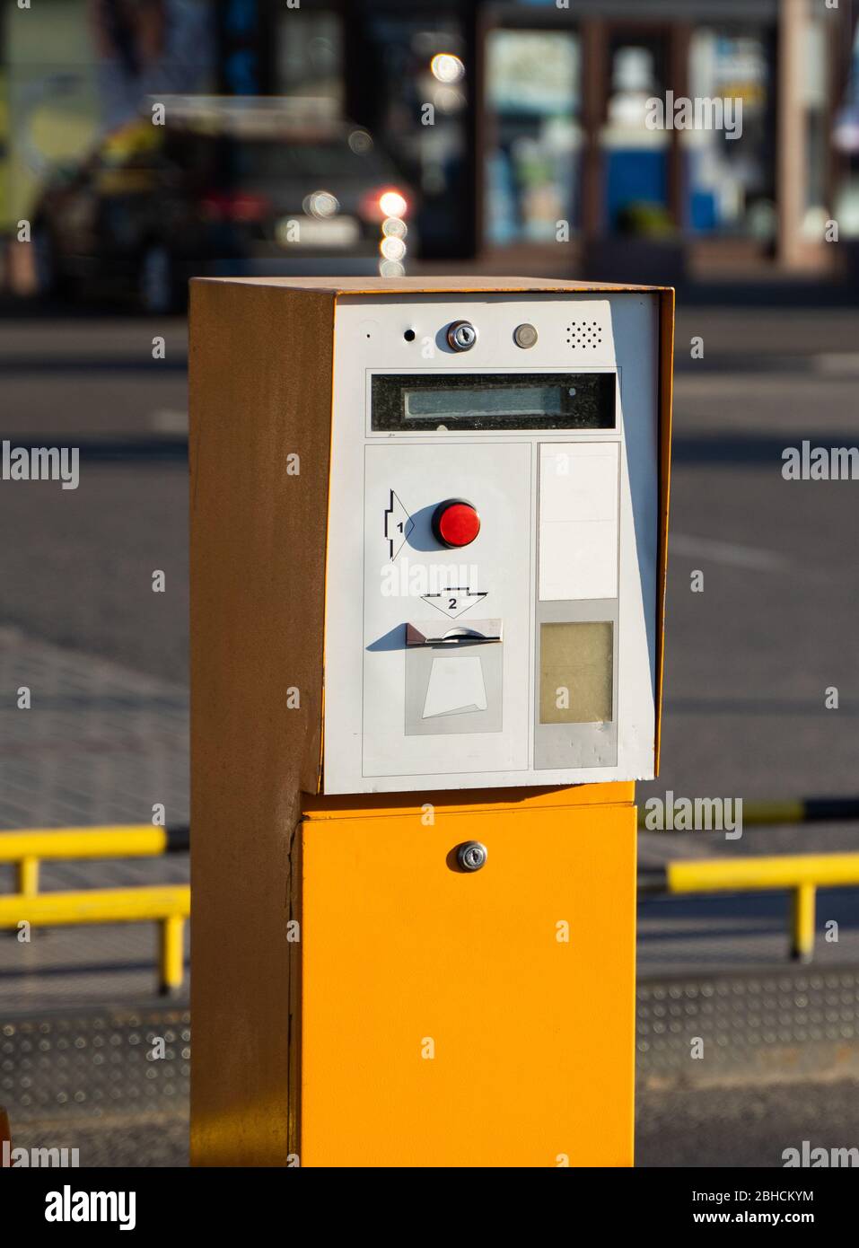 Parking tickets machine on a entree in parking area Stock Photo - Alamy