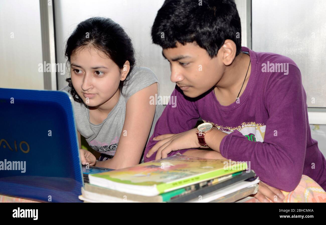 Desk sister computer hi-res stock photography and images - Alamy