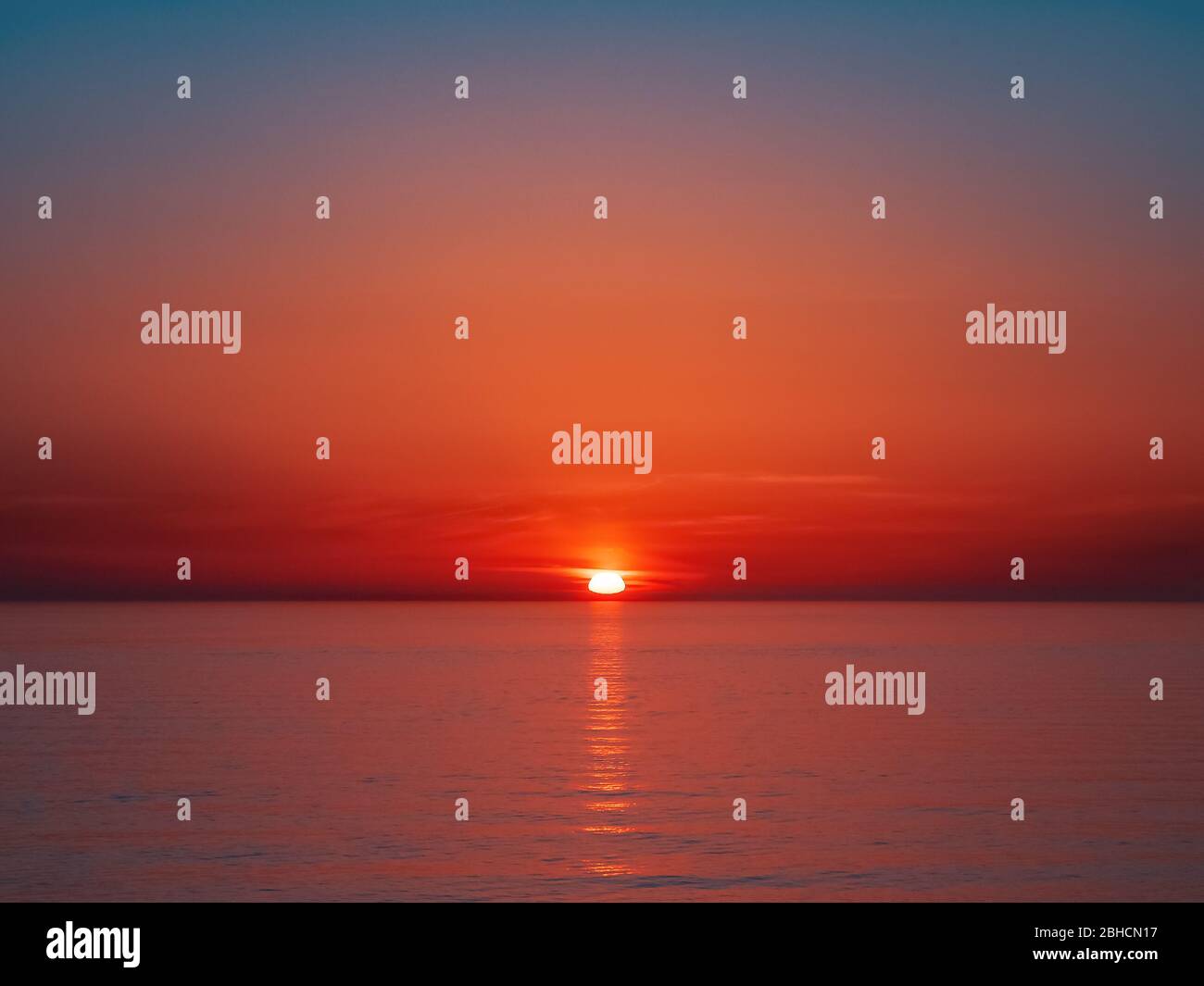 Beautiful bright red sea sunset without people and objects Stock Photo ...