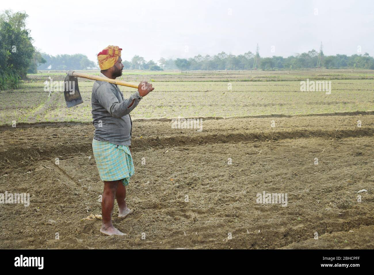 Man carrying plough hi-res stock photography and images - Alamy