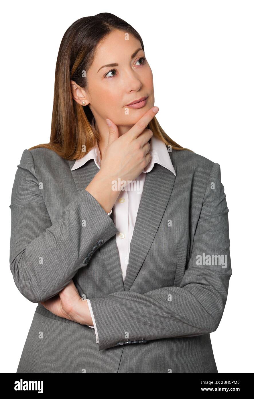 Thinking business woman holding hand under chin and arms folded ...