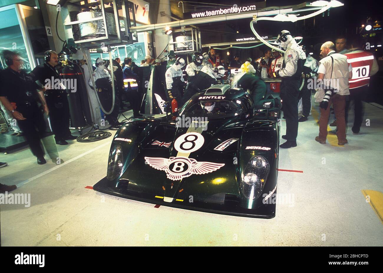 Bentley Speed 8 car number 8 in the Pits at night in the 2001 Le Mans ...