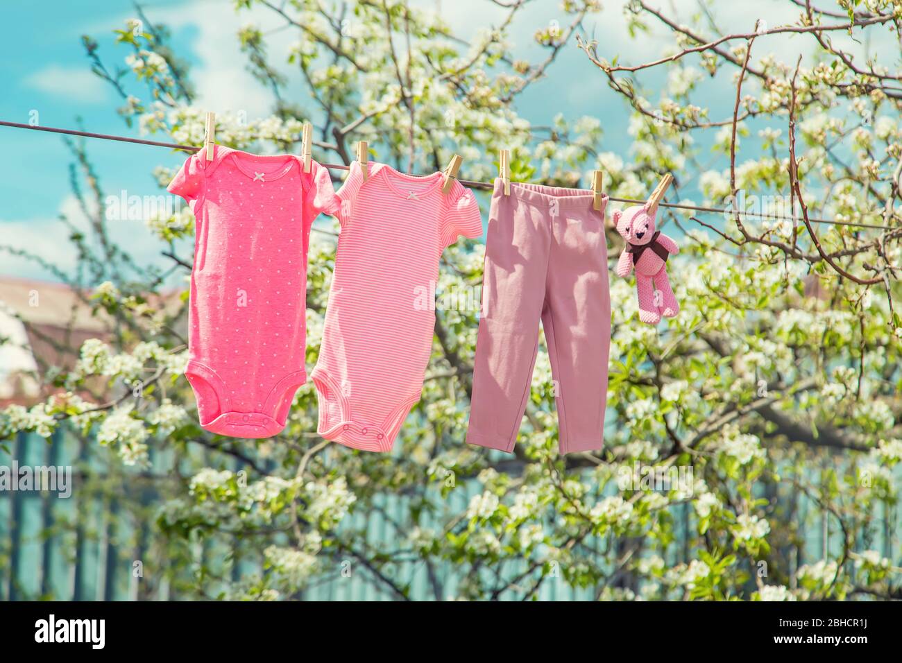 Baby clothes are drying on the street. Selective focus. nature Stock ...