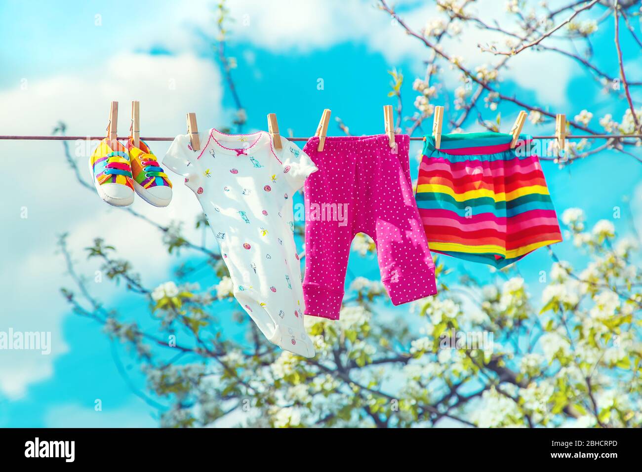 Baby clothes are drying on the street. Selective focus. nature Stock ...