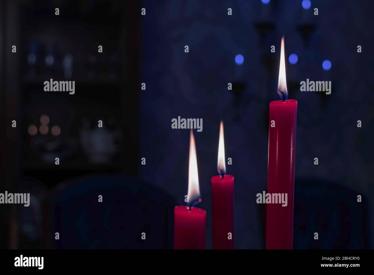 Three red candles hi-res stock photography and images - Alamy