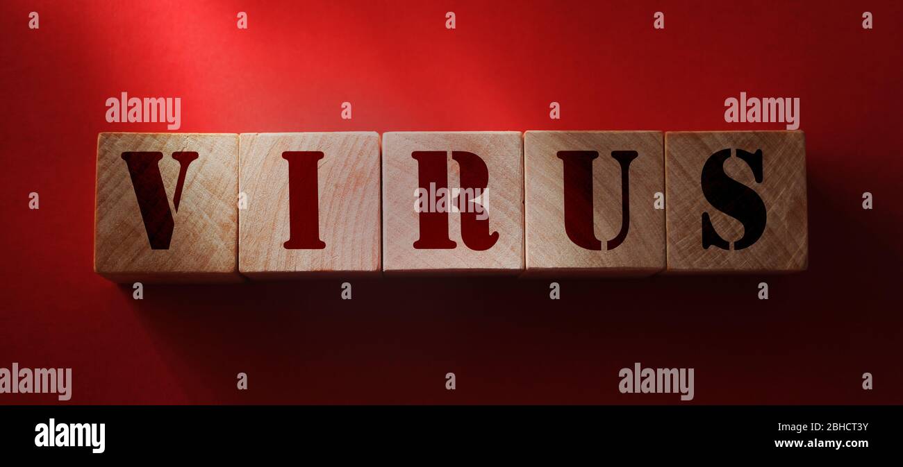 Word VIRUS made with wooden blocks. Healthcare medical concept Stock ...