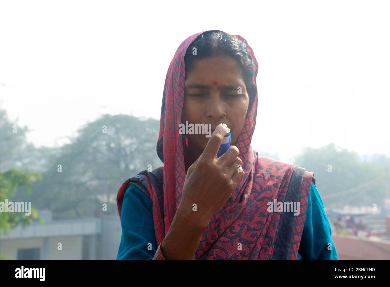 Indian using inhaler hi-res stock photography and images - Alamy