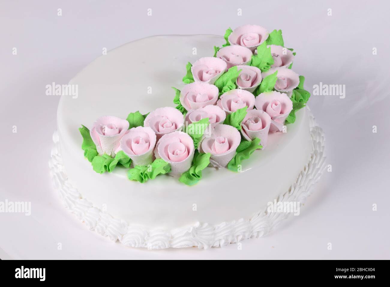Tasty Cake with cream flowers Stock Photo - Alamy