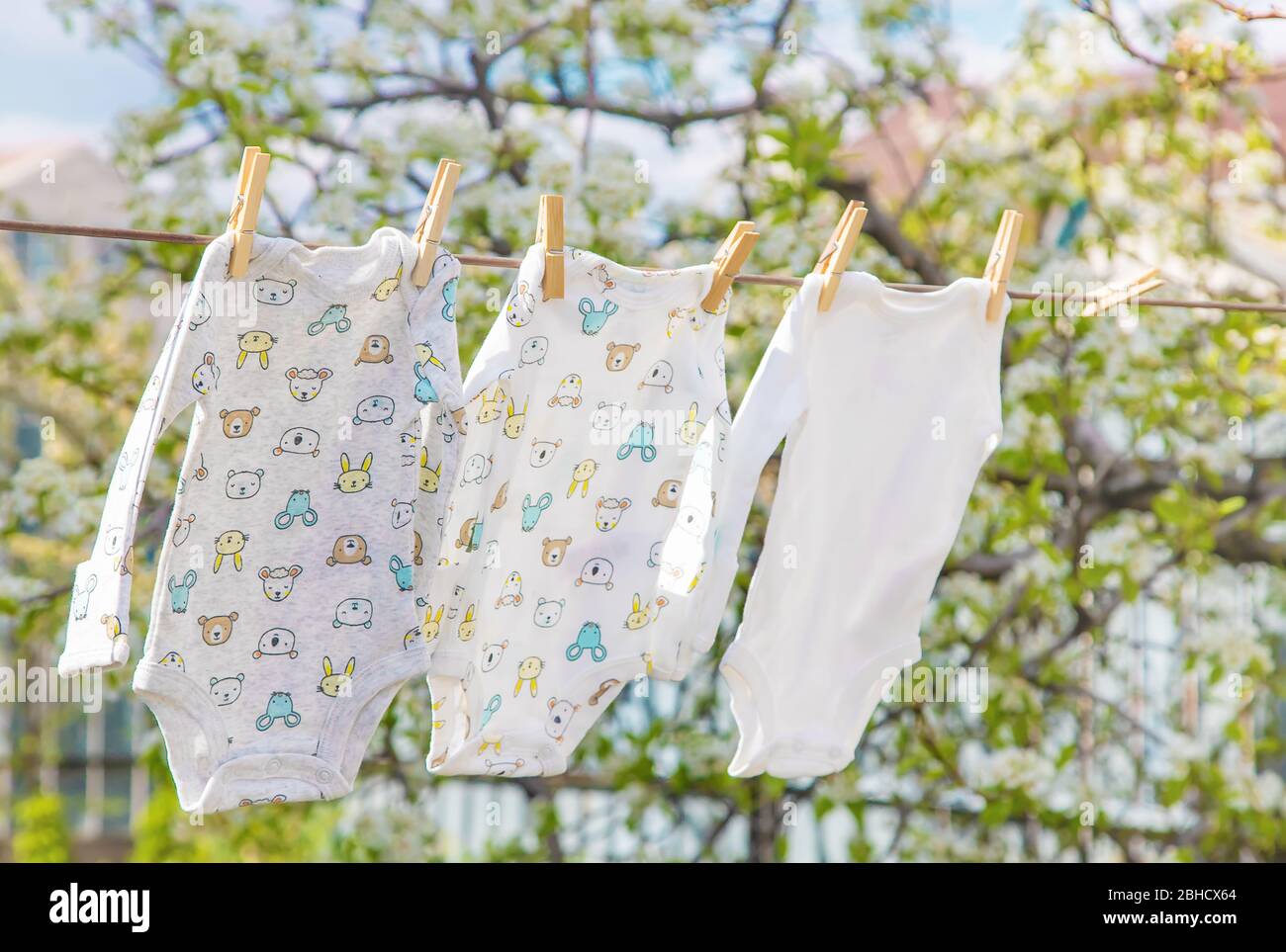 Baby clothes are drying on the street. Selective focus. nature Stock ...