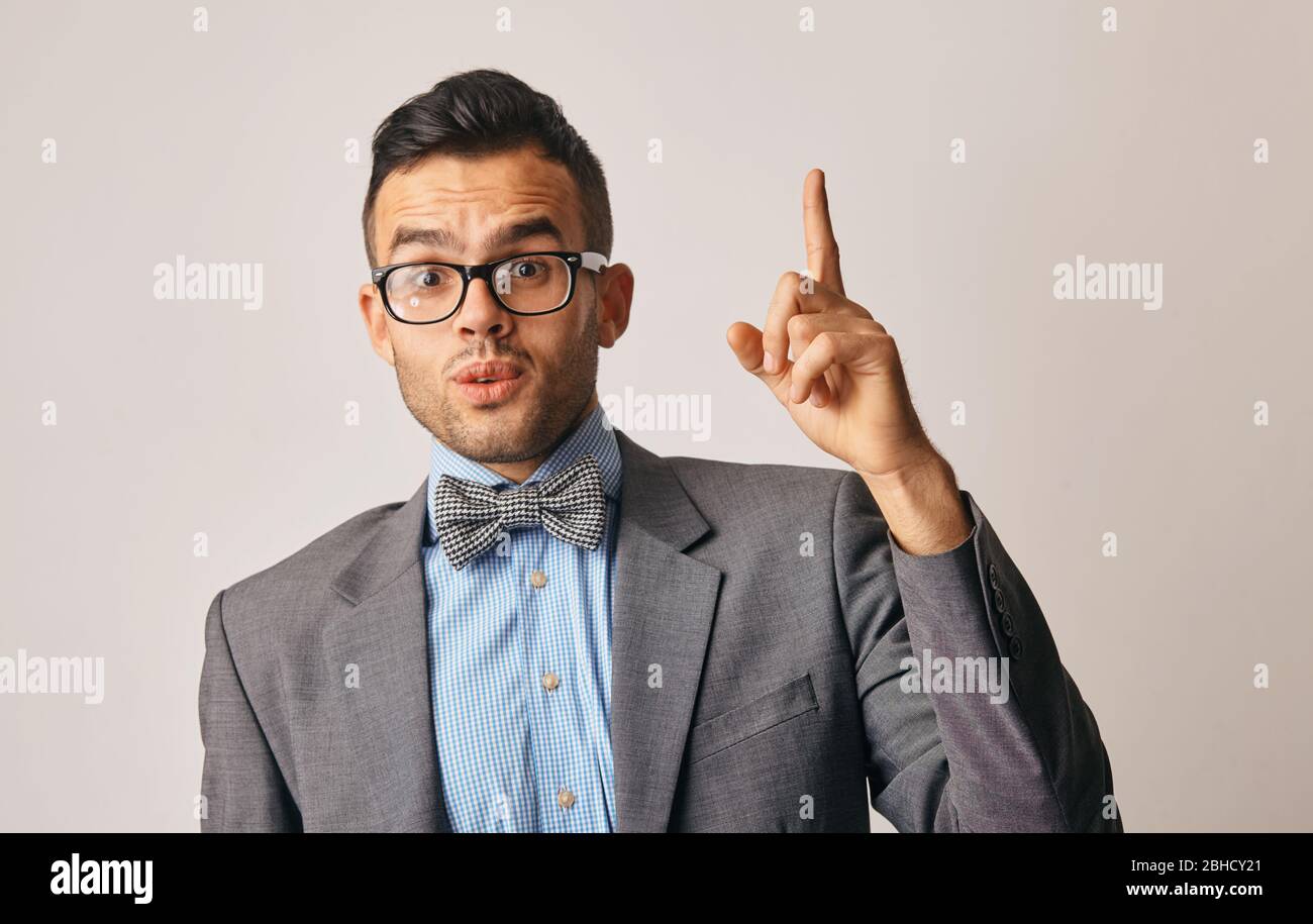 Young smiling man having a good idea Stock Photo - Alamy