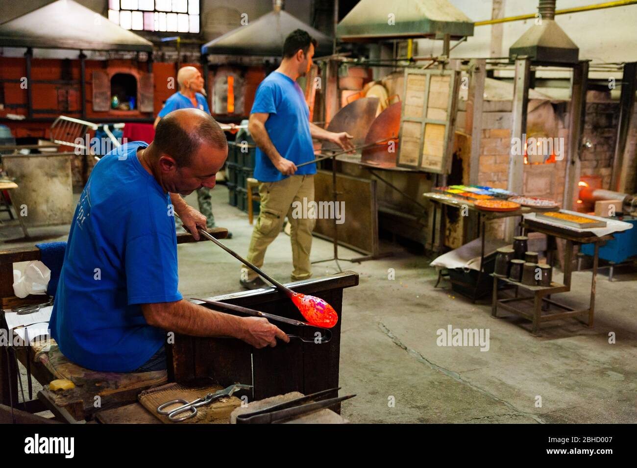 Venice, italy - 20 january 2020: italian artisan glassworker melting ...