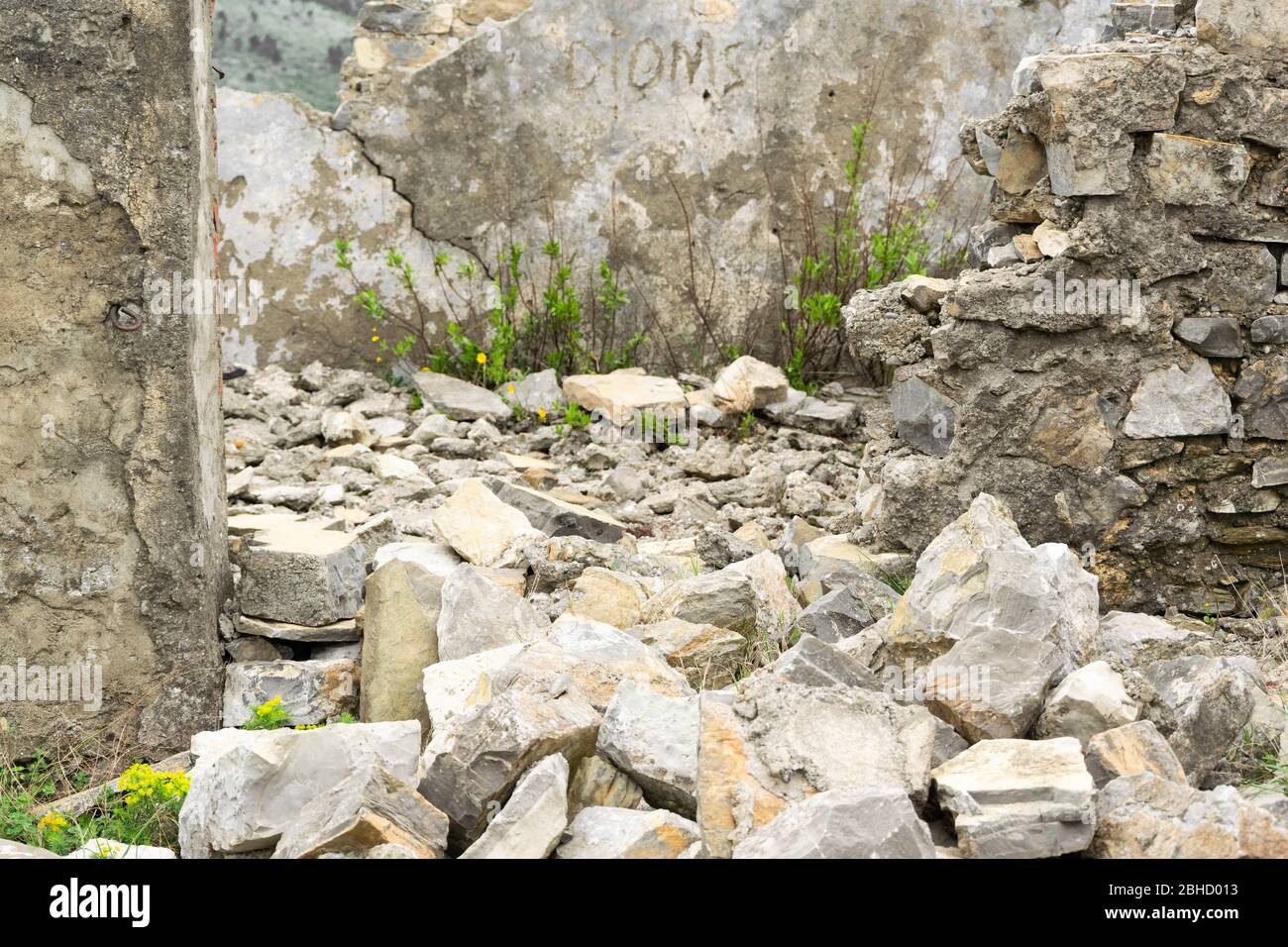 Building of ruins with text "Dionis", destroyed structure Stock Photo ...