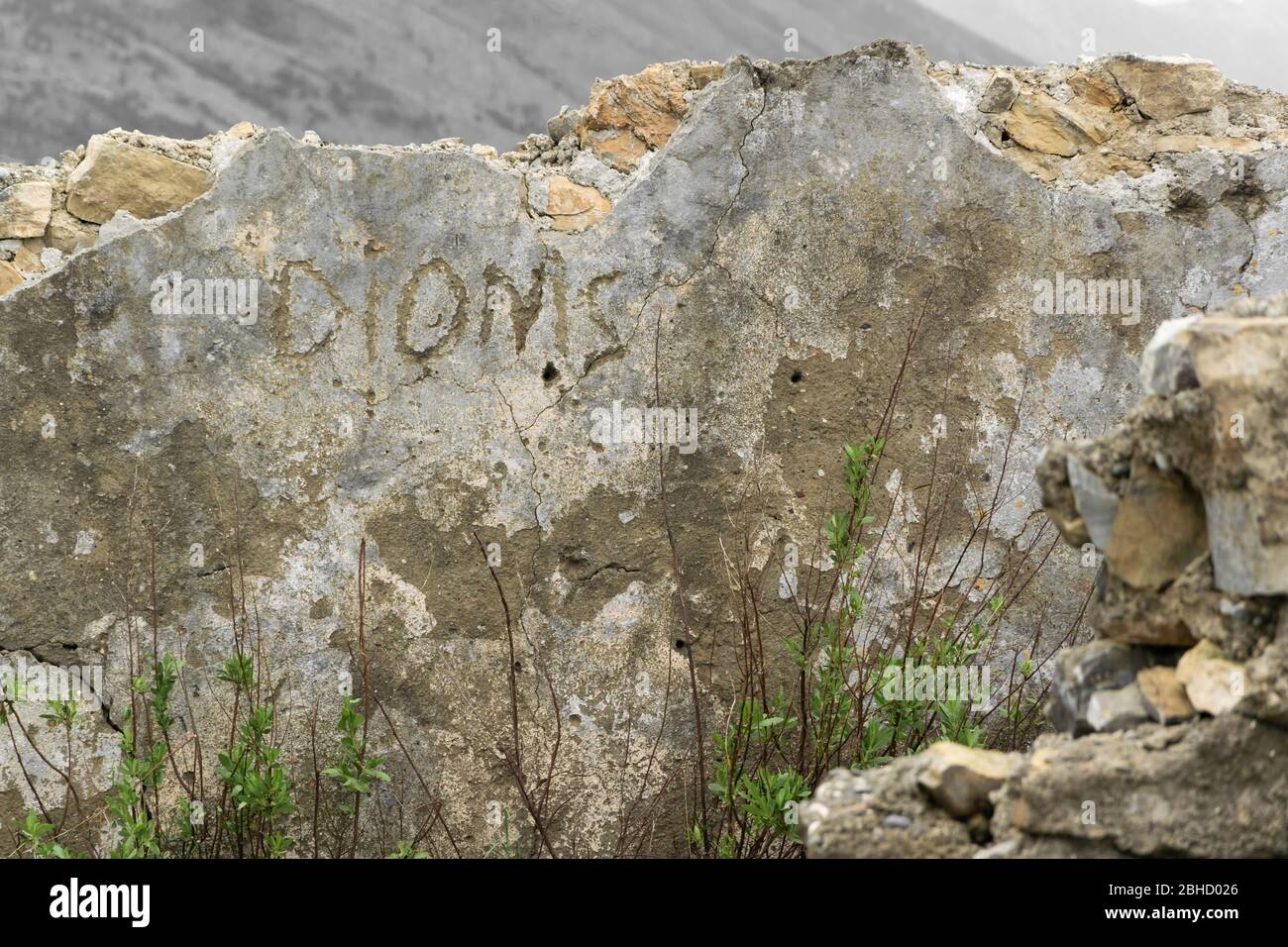Building of ruins with text "Dionis", destroyed structure Stock Photo ...