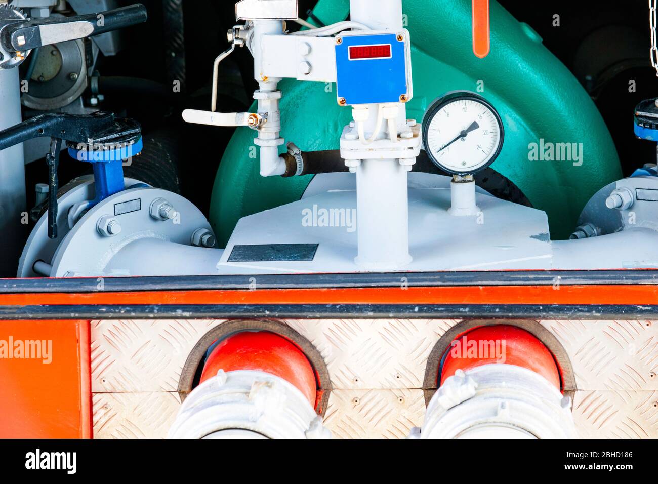 pump compartment of a fire engine with a pump and communications ...