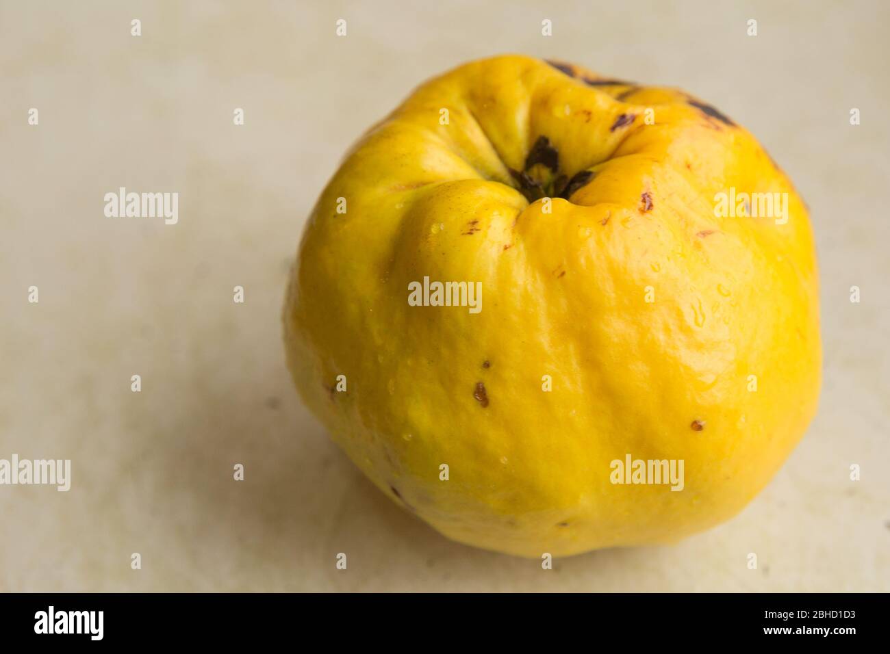 fresh yellow quince with slice isolated white background . Quince on a ...