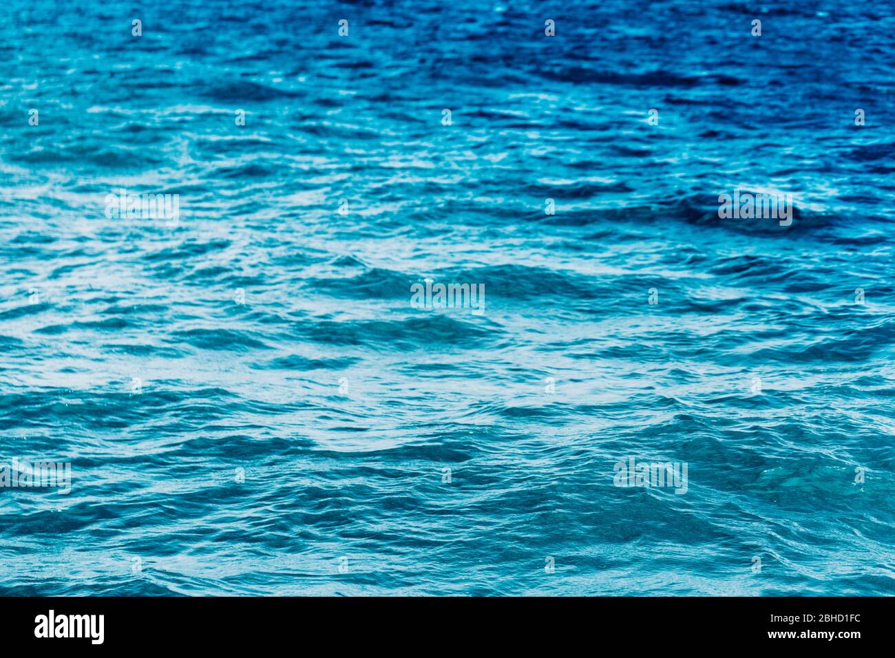 Bright Blue ocean with smooth wave background Stock Photo - Alamy