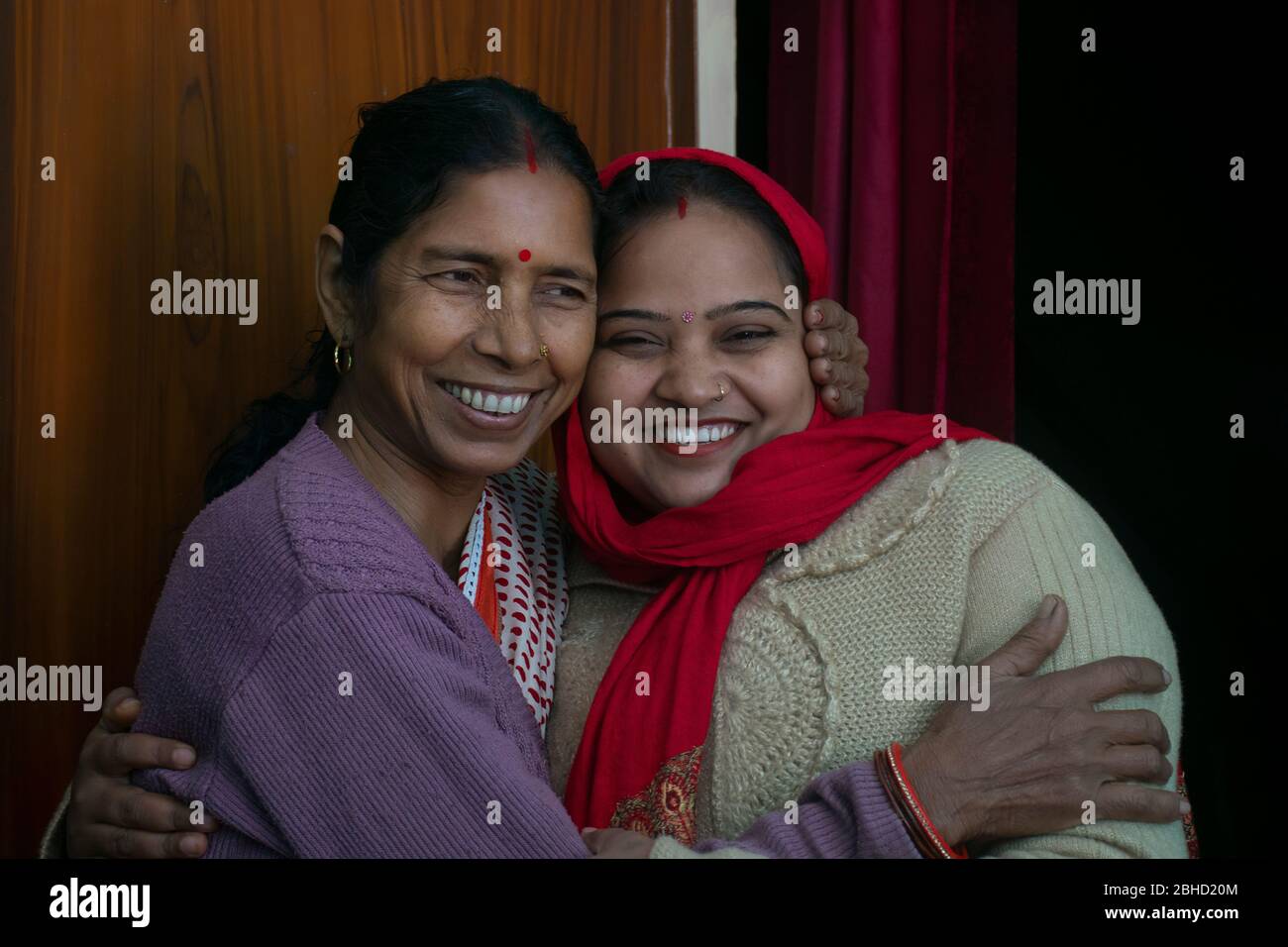 indian mother and daughter hugging each other, India Stock Photo - Alamy