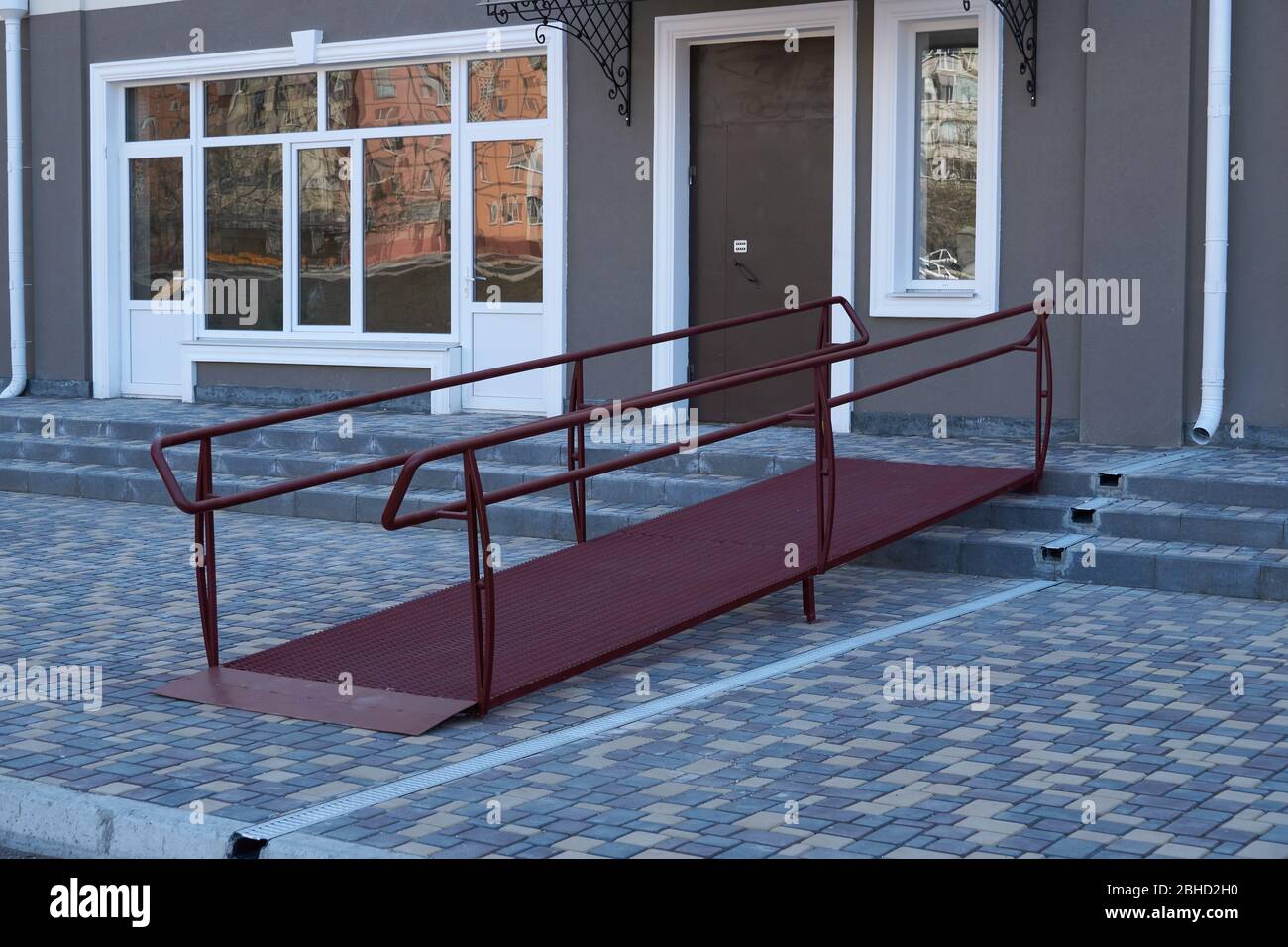 Wheelchair access ramp for entrance of residential multistory building ...