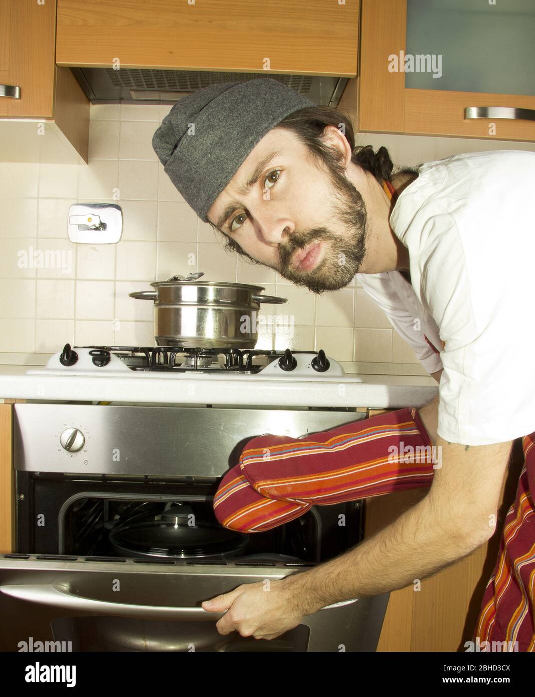 Cook over oven hi-res stock photography and images - Alamy