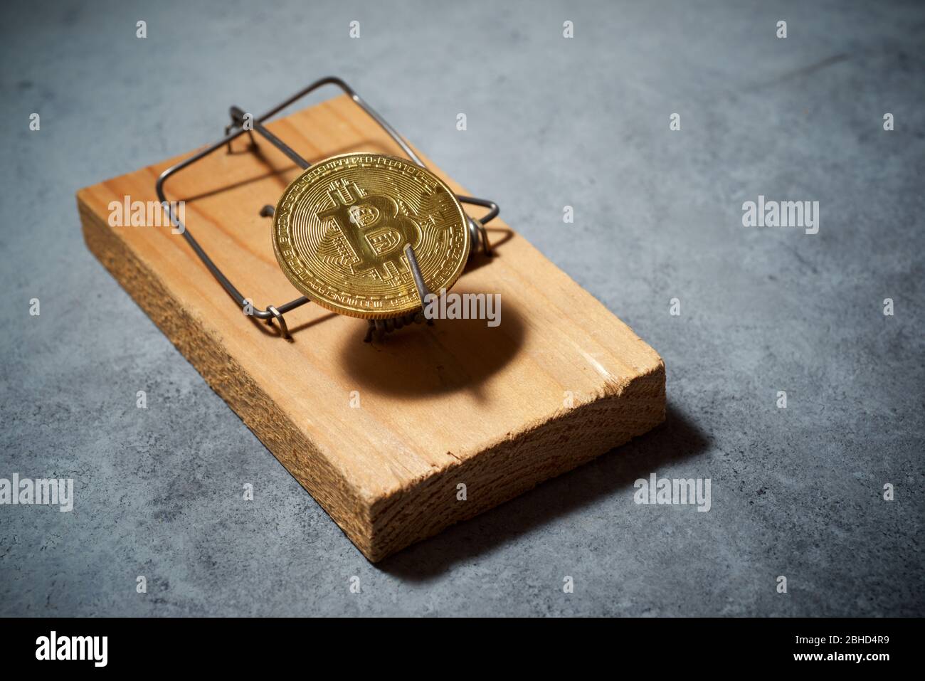 Bitcoin on a mouse trap Stock Photo - Alamy