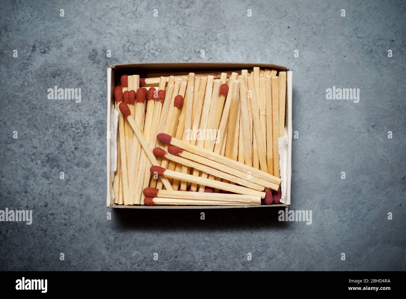 Matches on a stone table Stock Photo - Alamy