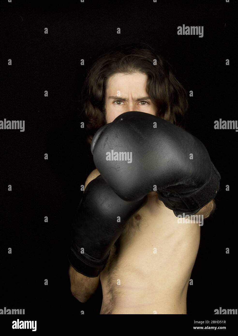 a small thin man that makes boxing Stock Photo - Alamy