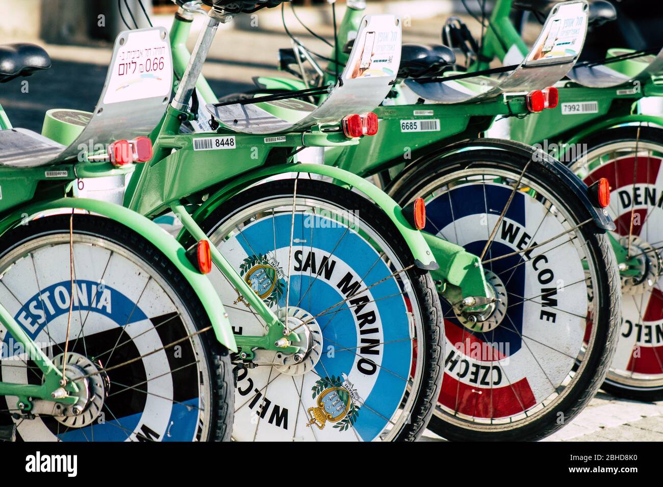Tel Aviv Israel June 10, 2019 View of green electric bicycles to hire ...