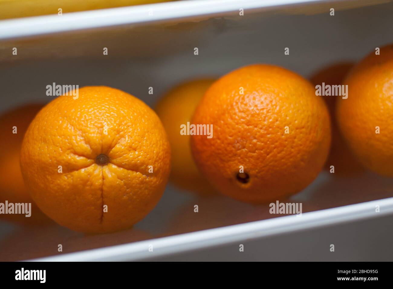 Oranges in container close up hi-res stock photography and images - Alamy