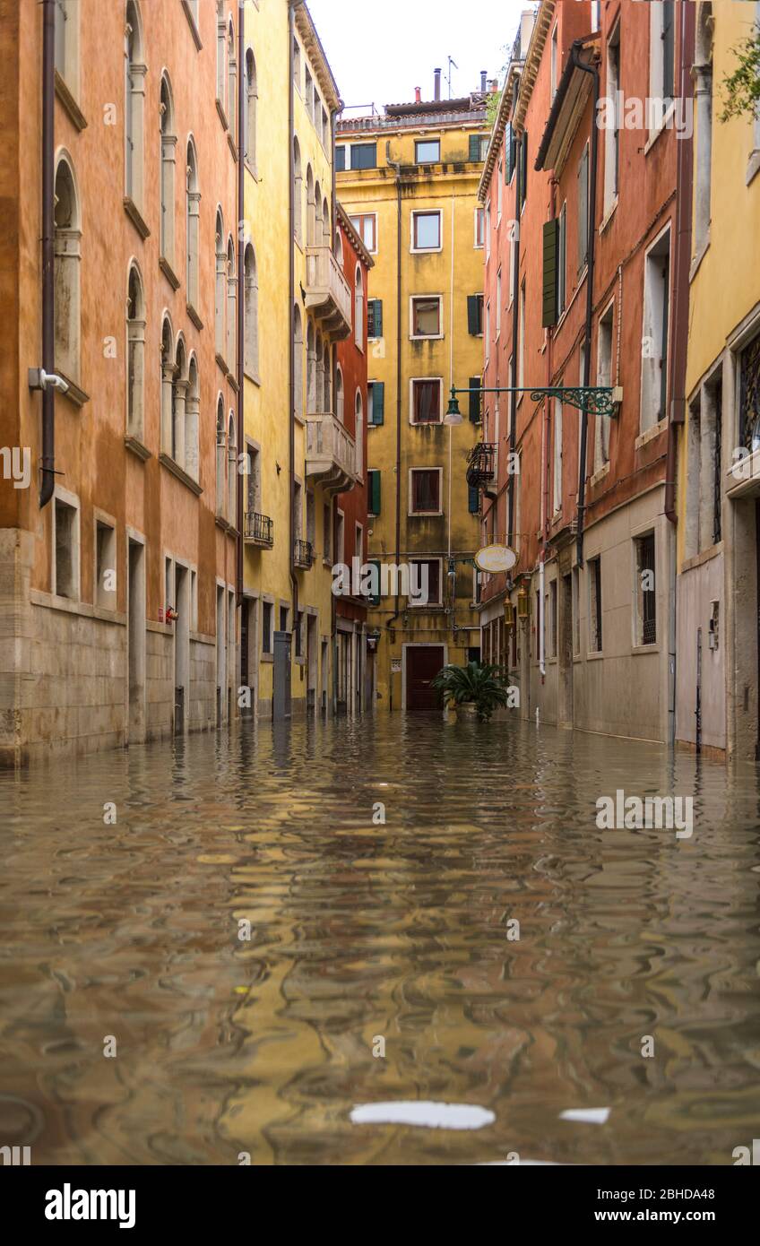 Venice, Italy - 1 November 2018: acqua alta, view on a street has been ...