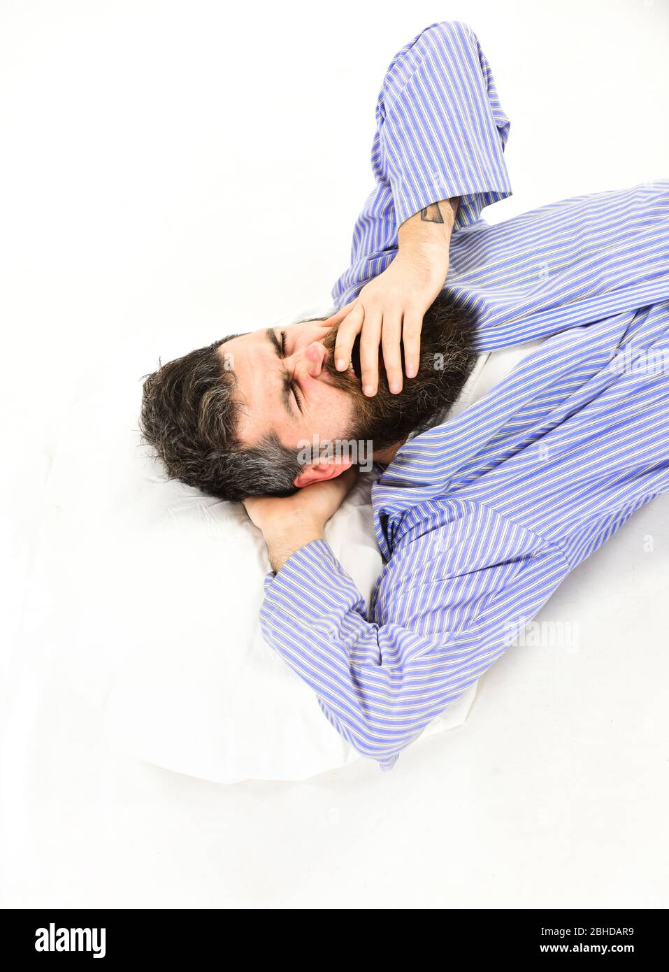 Sleepy morning concept. Man relax and having rest, white background ...