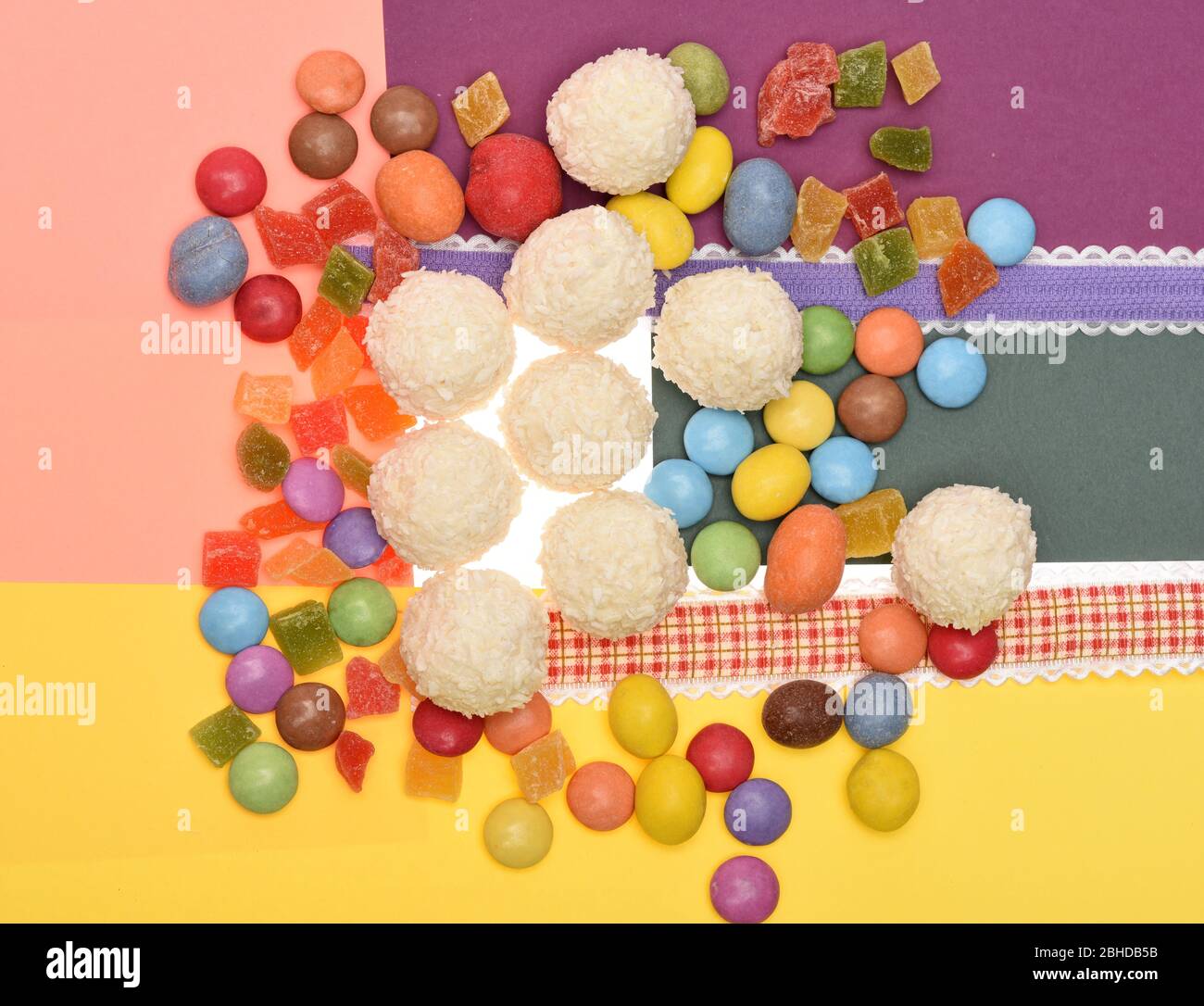 Coconut ball and colorful sweets, dragee, candy, candied fruit ...