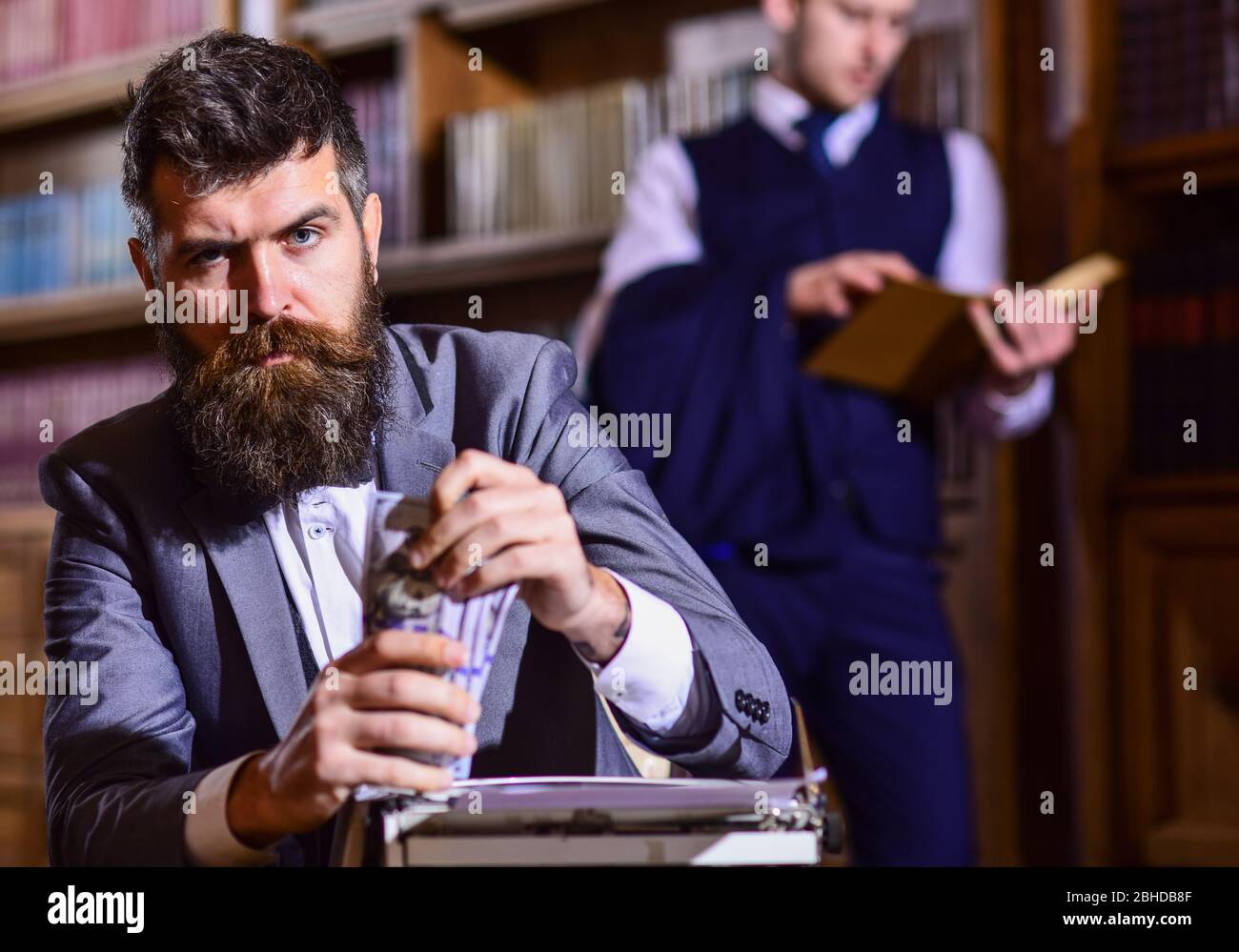Yellow press concept. Man in oldfashioned suit holds money. Journalist ...