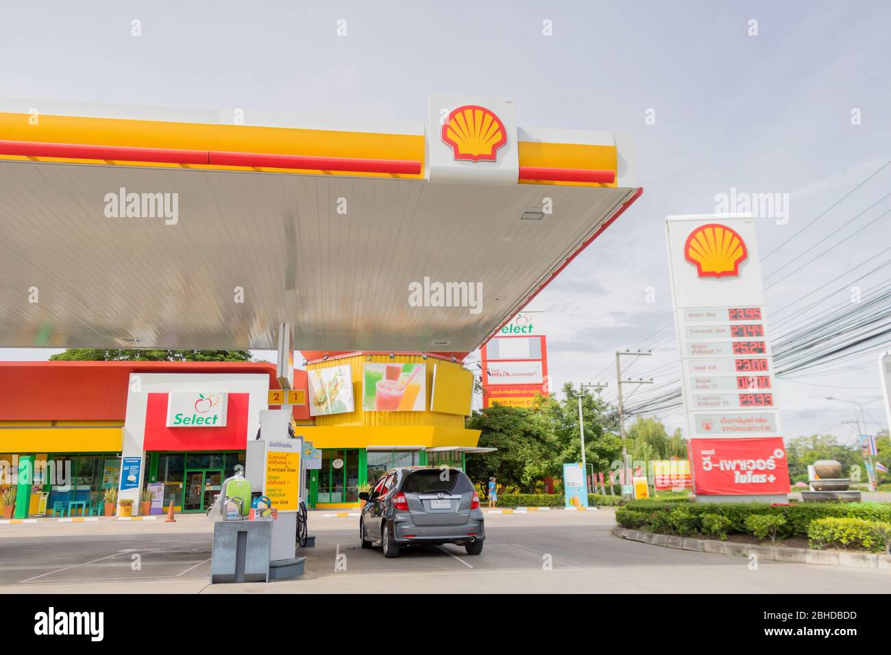 The small car is parking at oil dispener of Shell gas station in Hua ...
