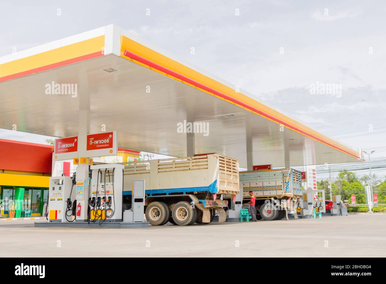 The two big trucks are refueling from Shell gas station in Hua Hin ...