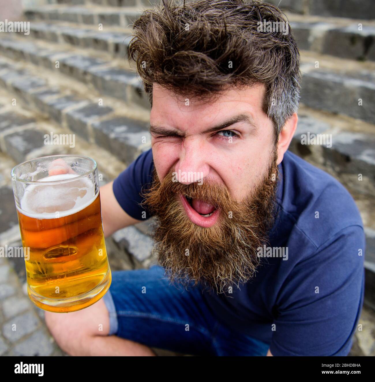 Celebration concept. Guy having rest with draught beer. Man with beard ...